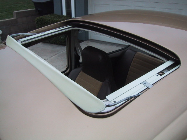 Factory sunroof with wind deflector were cleaned and detailed like crazy.